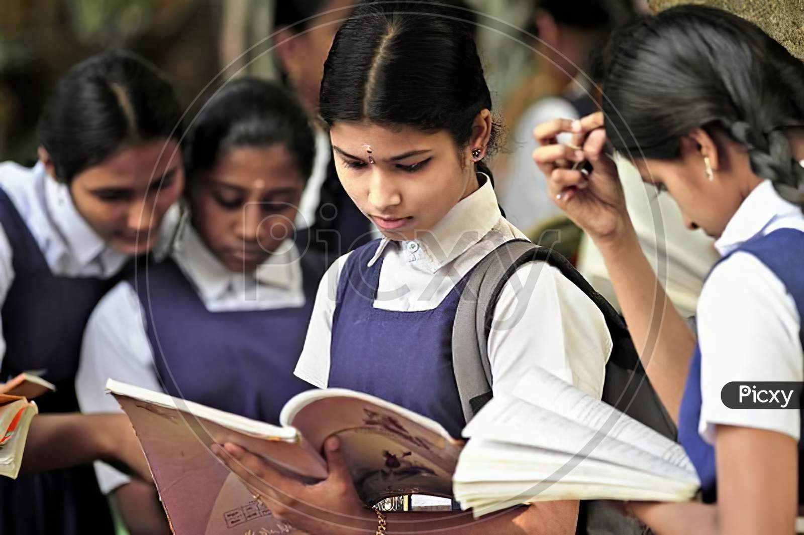 Image of Unidentified girl with her classmates in government school ...