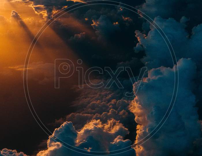 Image of Clouds are bathing in the shower of sun-MD570473-Picxy