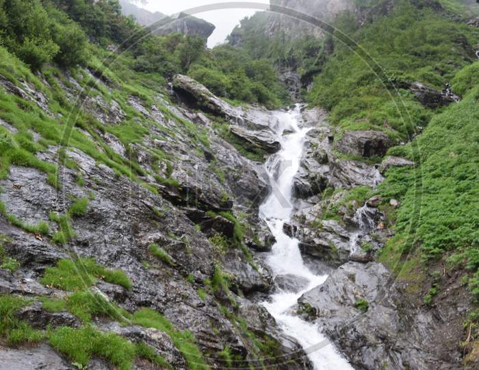 Image of Picture of one of the streams flowing as waterfall in Manali ...