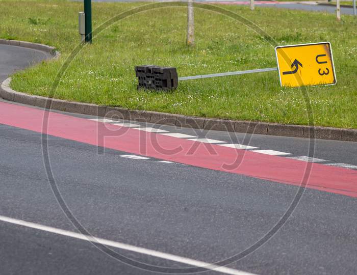 Image of Yellow traffic sign for redirection on urban streets forces ...