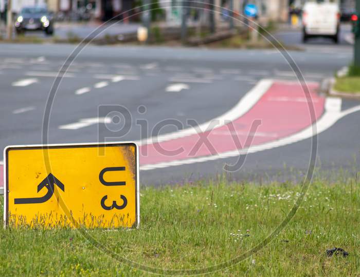 Image of Yellow traffic sign for redirection on urban streets forces ...