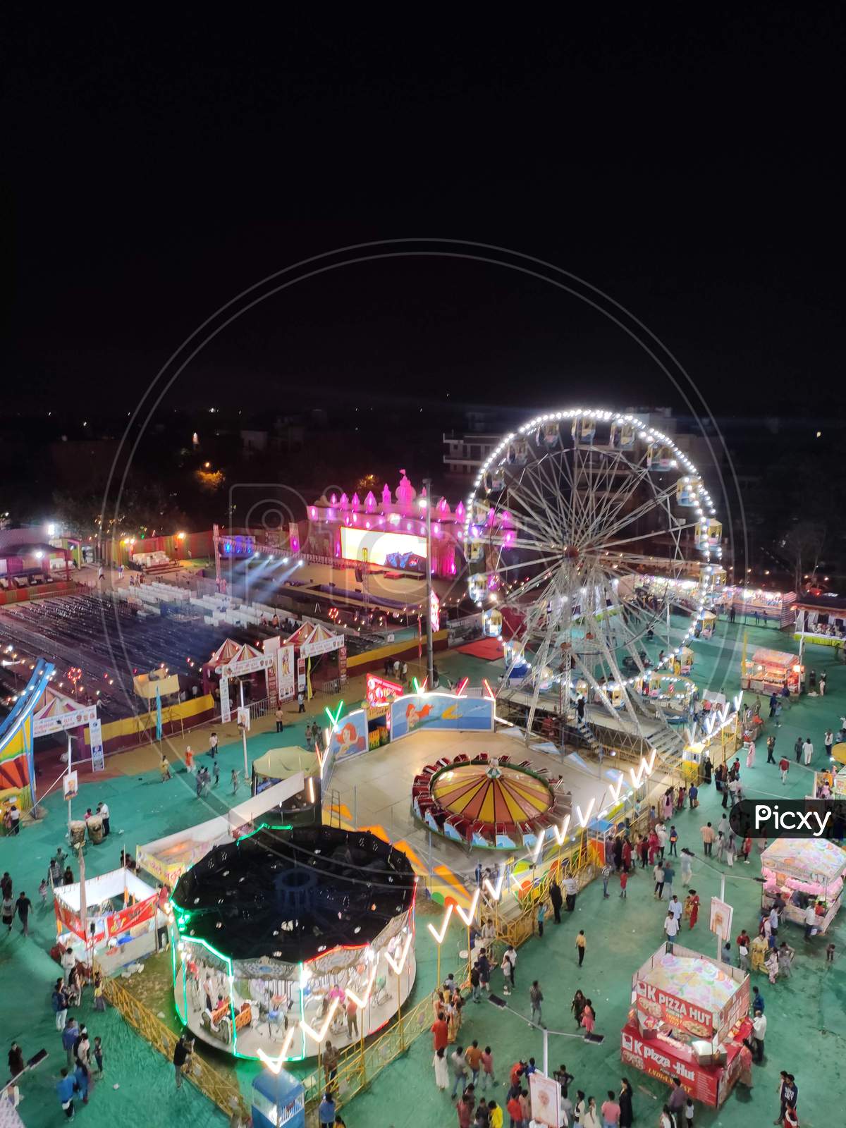 Image of FERRIS WHEEL IN DIWALI FAIR-DY878901-Picxy