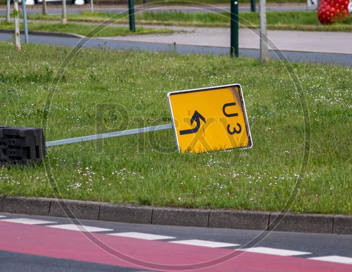 Image of Yellow traffic sign for redirection on urban streets forces ...