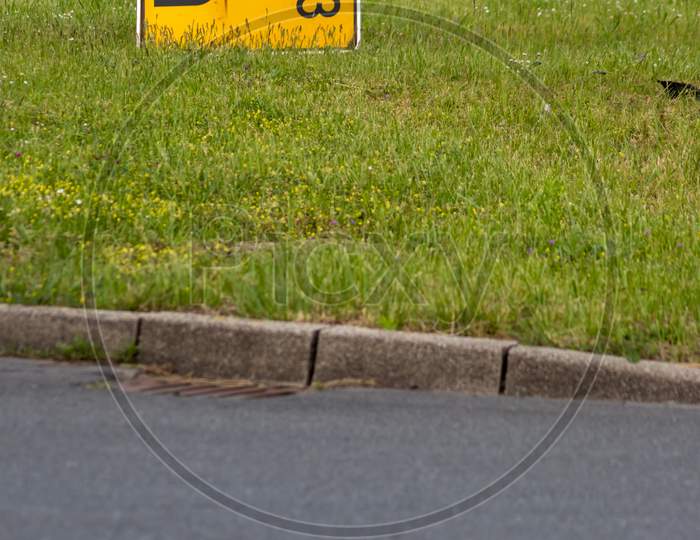 Image of Yellow traffic sign for redirection on urban streets forces ...