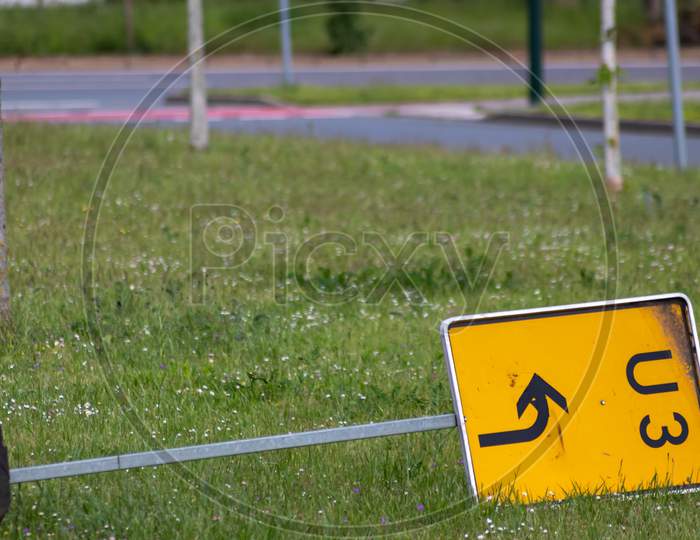 Image of Yellow traffic sign for redirection on urban streets forces ...