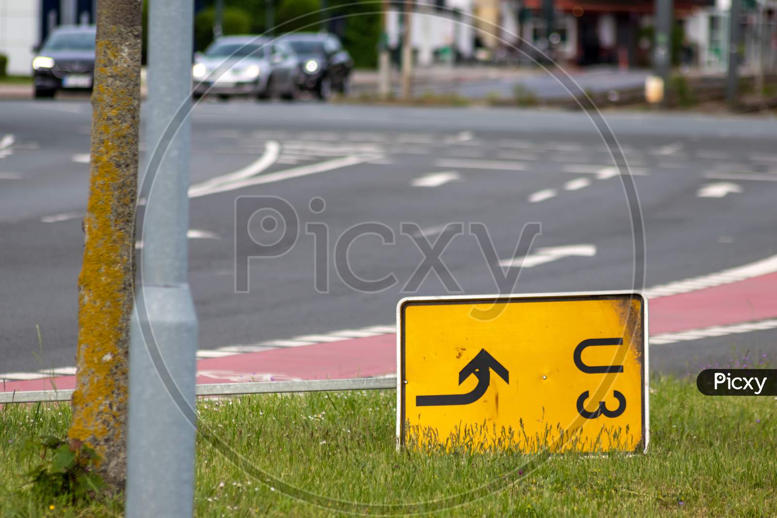 Image of Yellow traffic sign for redirection on urban streets forces ...