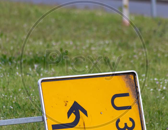 Image of Yellow traffic sign for redirection on urban streets forces ...