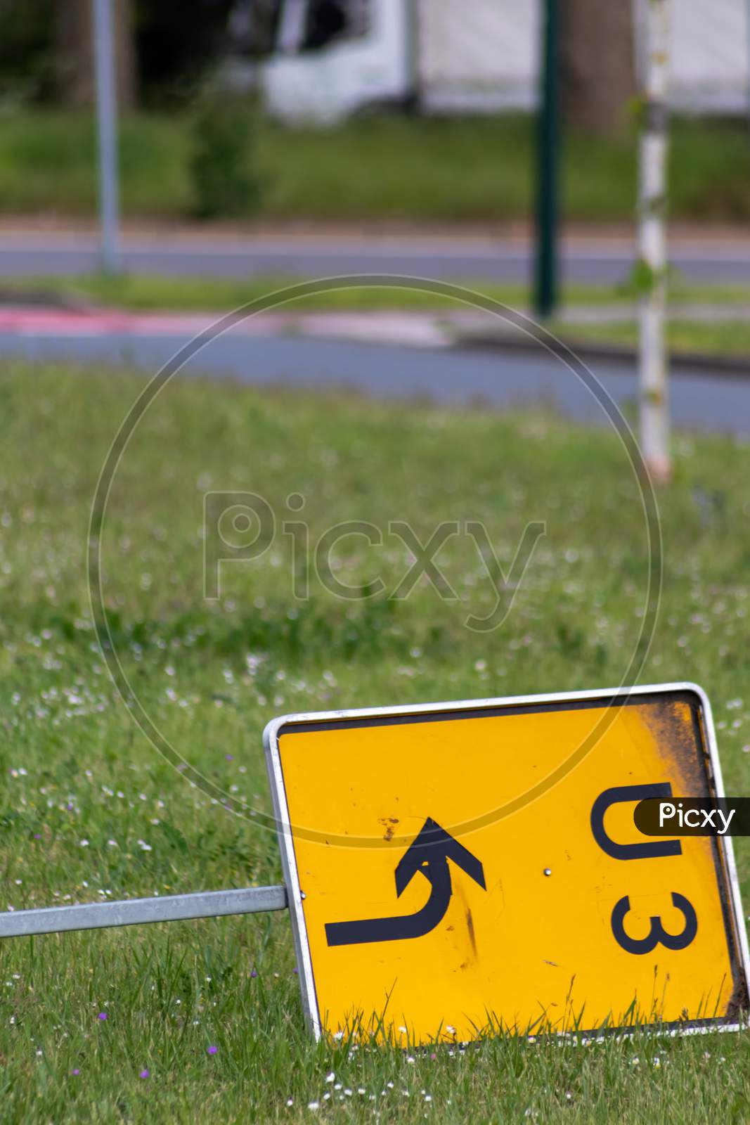 Image of Yellow traffic sign for redirection on urban streets forces ...