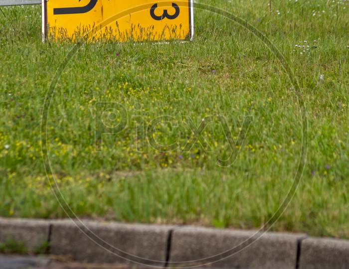 Image of Yellow traffic sign for redirection on urban streets forces ...