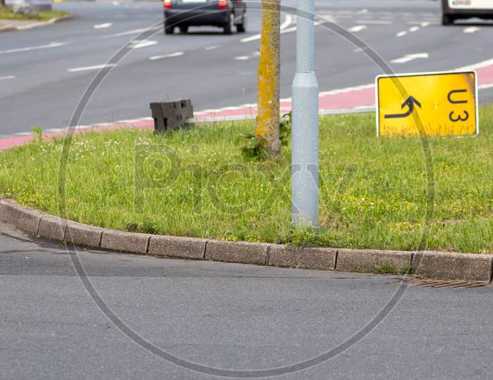 Image of Yellow traffic sign for redirection on urban streets forces ...