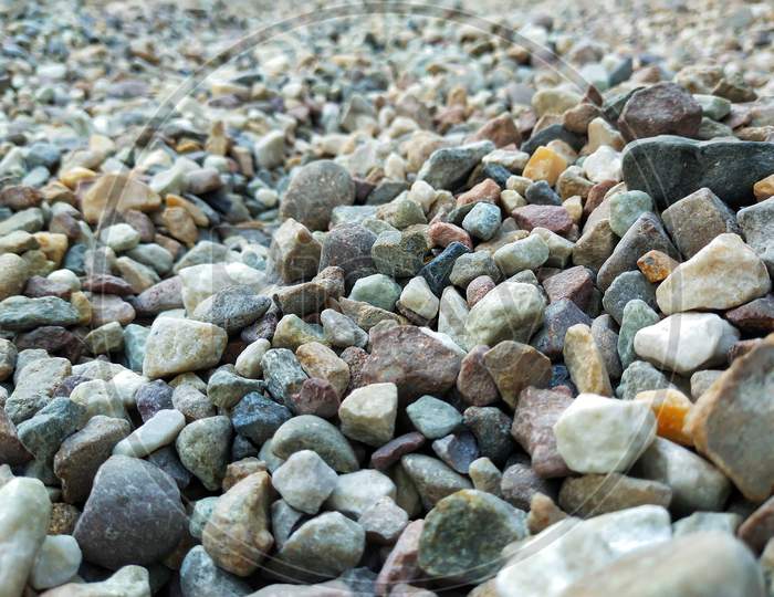 Image of Sea pebbles. Background of pebbles. Wet stones. Multicolored ...