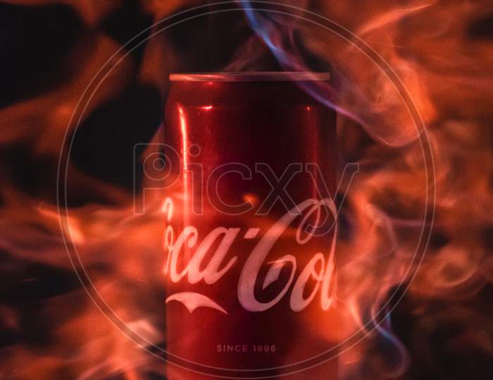 Image of Reflections of a Coca-Cola bottle on a solid surface-WB843025 ...