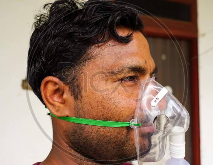 Image of Closeup Of Nasal Cannula For Oxygen Delivery On A Male Patient ...