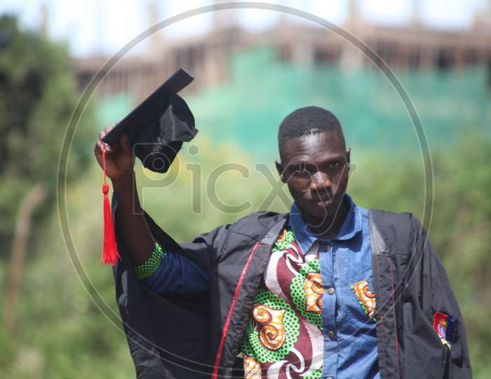 Image of Black man succeeds and achieves the graduation crown and ...