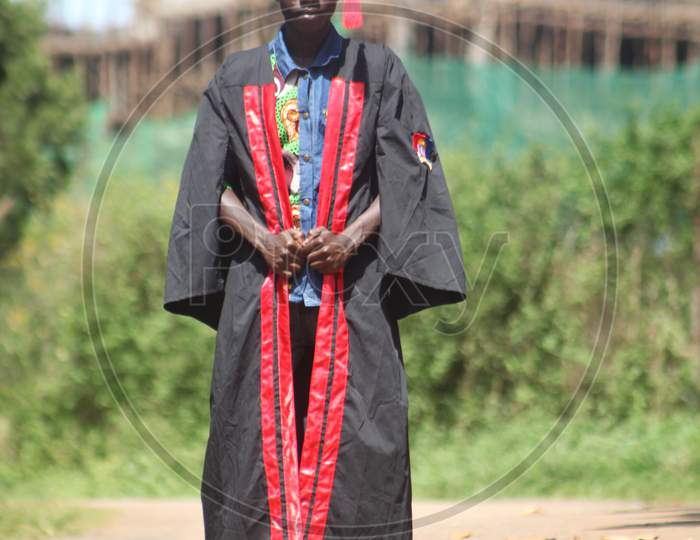 Image of Black American young man or grandaunt doing his graduation ...