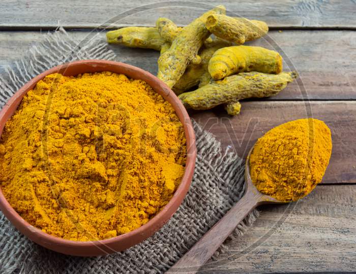 Image of Dry Turmeric Or Haldi Powder In A Earthen Bowl With Turmeric ...