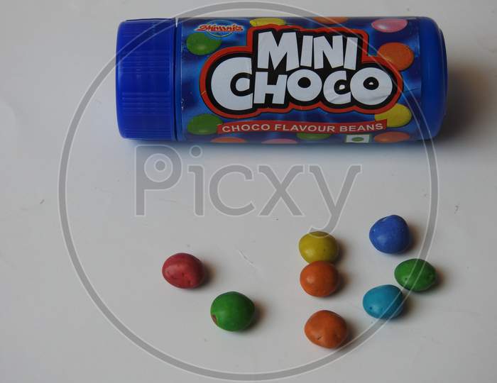 Image of Closeup of Mini Choco gems - Choco flavour colorful Beans and ...