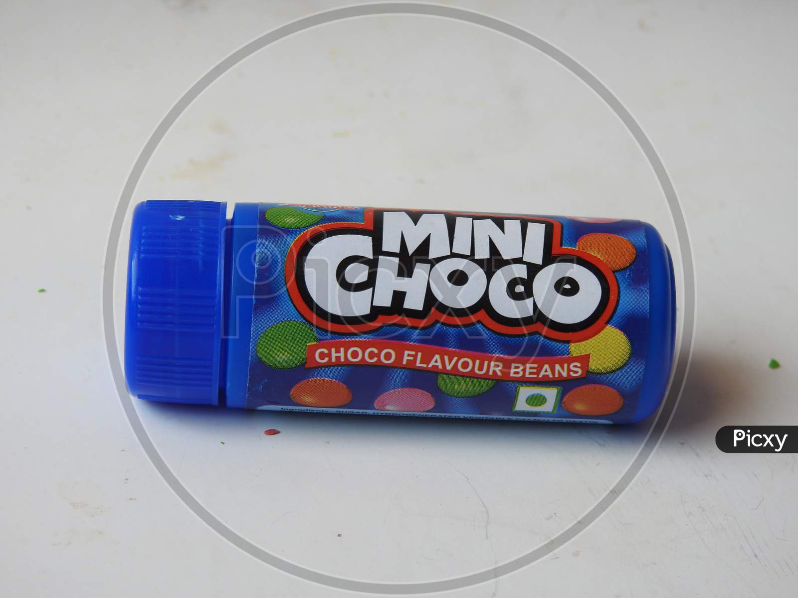 Image of Closeup of Mini Choco gems - Choco flavour colorful Beans and plastic container ...