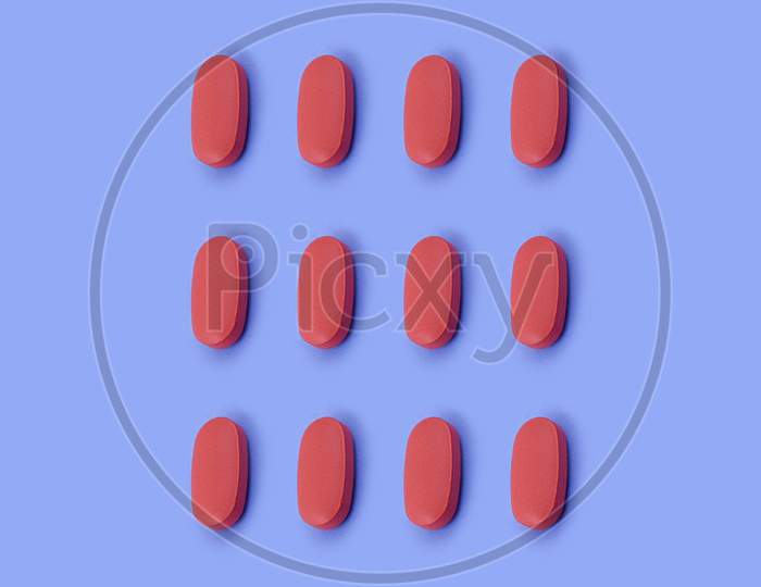 Image of Oval Shape Pharmaceutical Medicine Tablet On A Blue Background ...