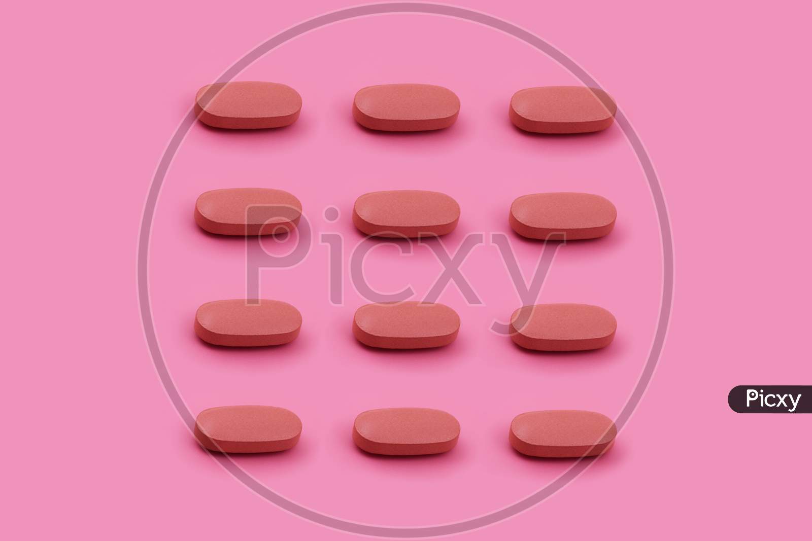 Image of Oval Shape Pharmaceutical Medicine Tablet On A Pink Background ...