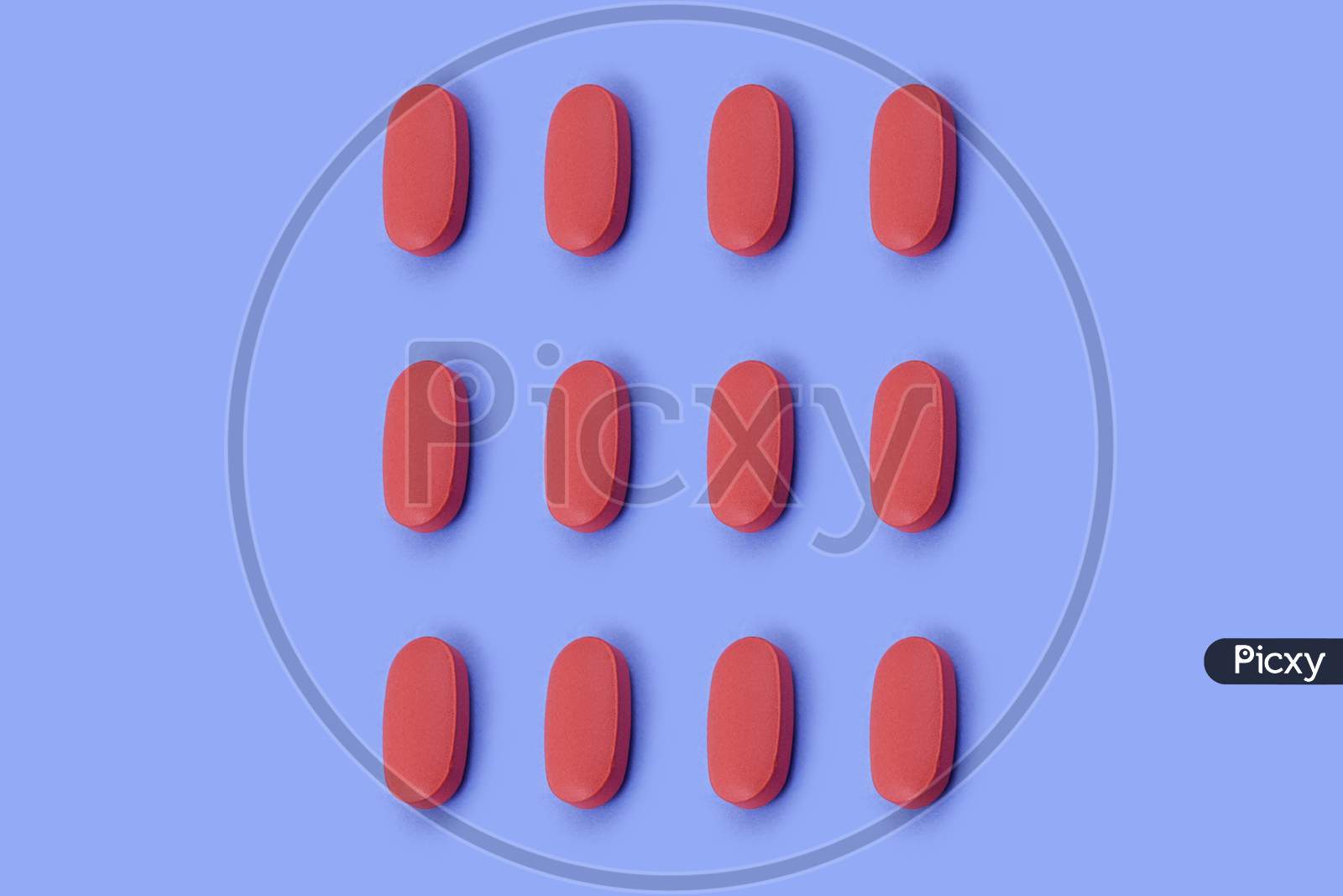 Image of Oval Shape Pharmaceutical Medicine Tablet On A Blue Background ...