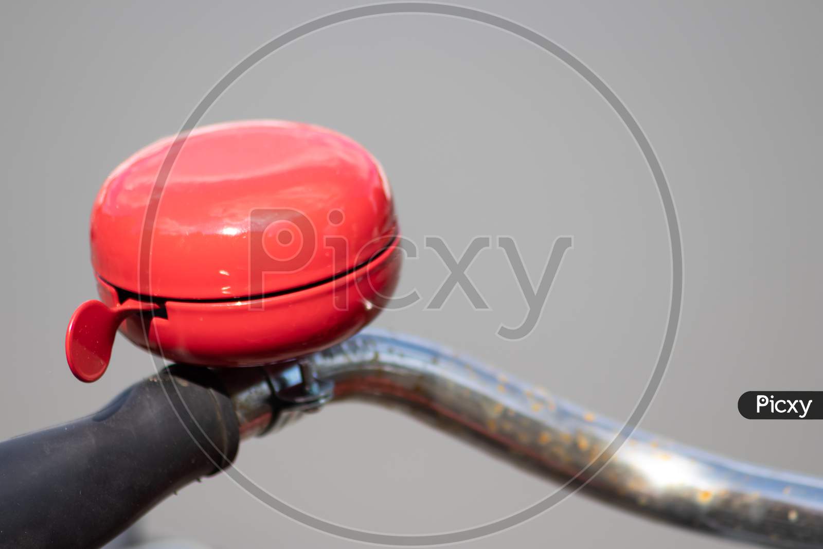 Image of Beautiful signal red bike bell ensures security in the road ...