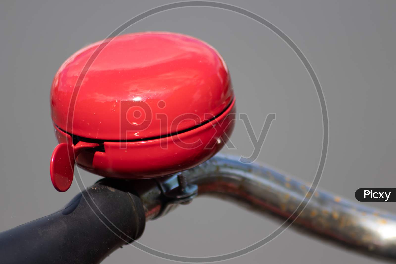 Image of Beautiful signal red bike bell ensures security in the road ...