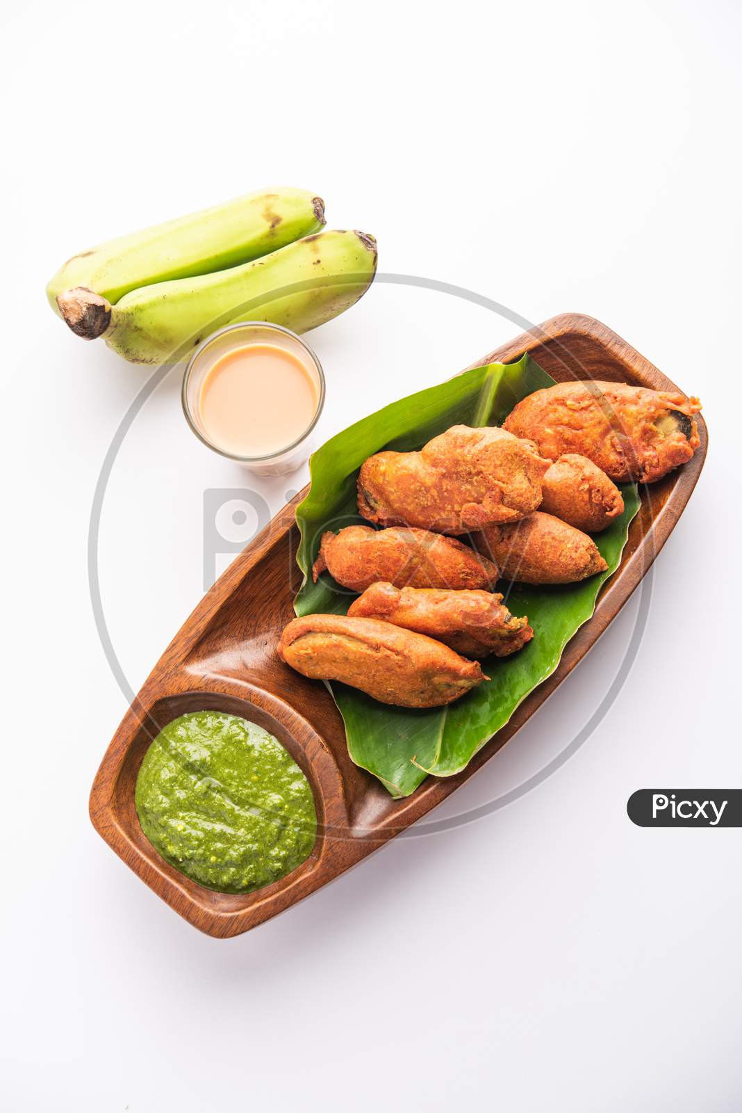 Image of Banana Fritter Or Pakora Or Raw Kela Pakoda Or Bajji Served ...