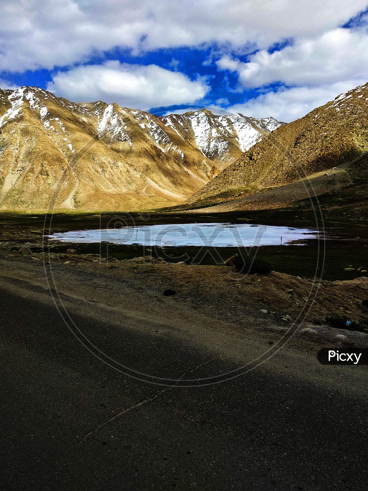 Image of small frozen lake in India-DC899679-Picxy