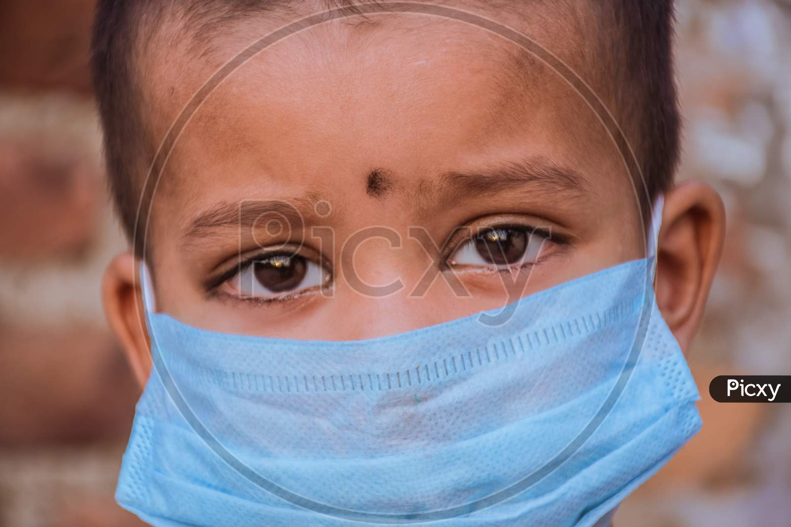 Image of Social distancing and wearing a mask helps slow the spread of ...
