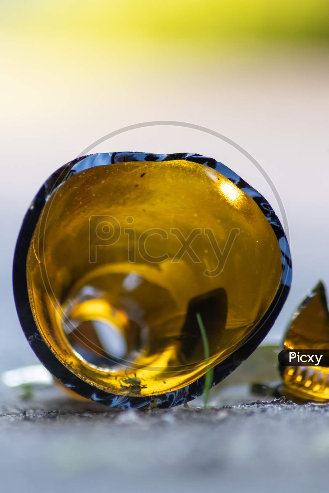Image of Sharp shards of a broken beer bottle on the ground with sharp ...