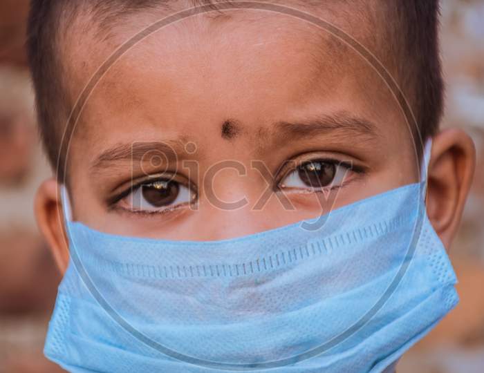 Image of Social distancing and wearing a mask helps slow the spread of ...