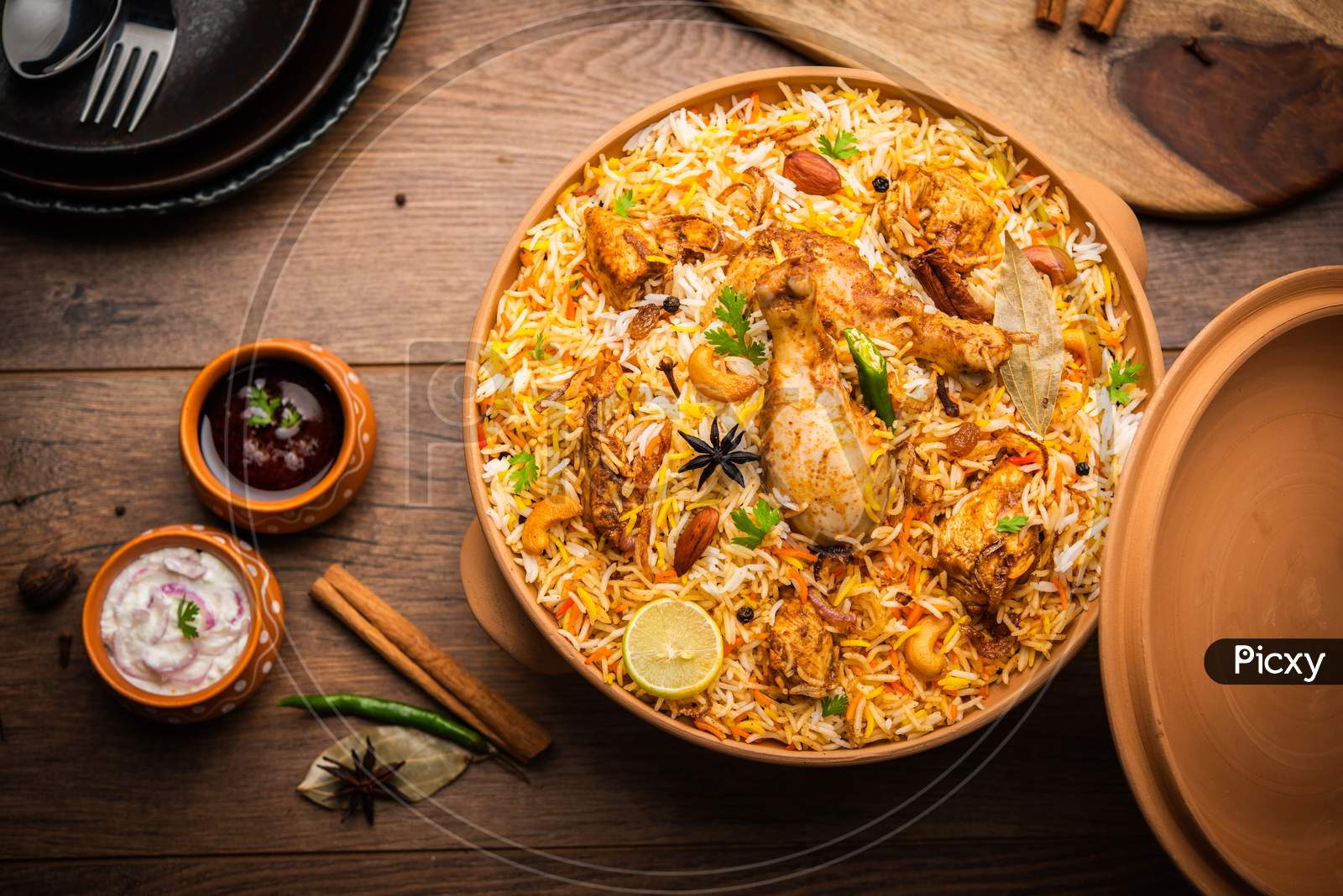 Image of Dum Handi Chicken Biryani Is Prepared In An Earthen Or Clay ...