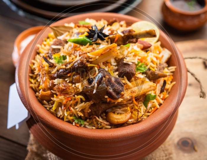 Image of Dum Handi Mutton Biryani Or Gosht Pilaf Is Prepared In An ...