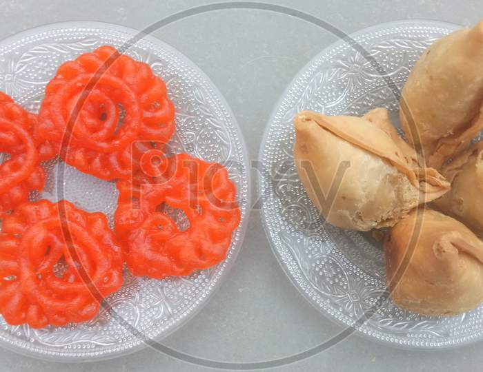 Image of Indian sweet Jalebi or imarti made with Ghee served in a plate ...
