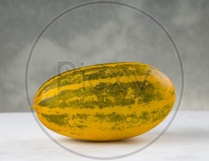 Image of Green And Yellow Big Raw Whole Dosakai Cucumber-MB656953-Picxy