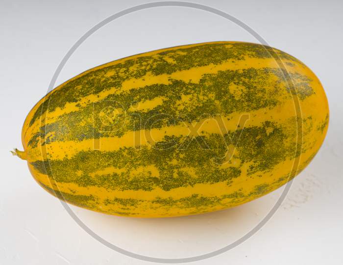 Image of Green And Yellow Big Raw Whole Dosakai Cucumber-MB656953-Picxy