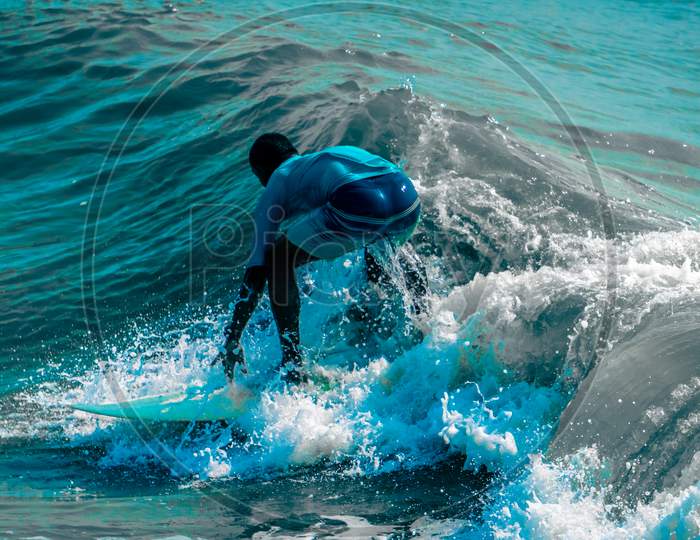 Image of Extreme Sports and Highspeed Action Photography - Picture of Surfer Man Surfing On Blue ...