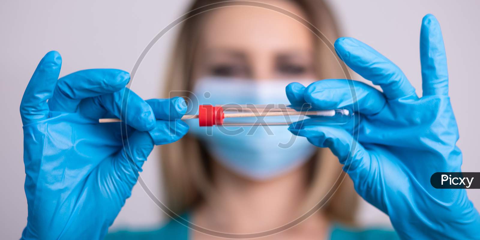 Image of Nurse With Facemask Holding Coronavirus Covid-19 Swab Test Kit ...