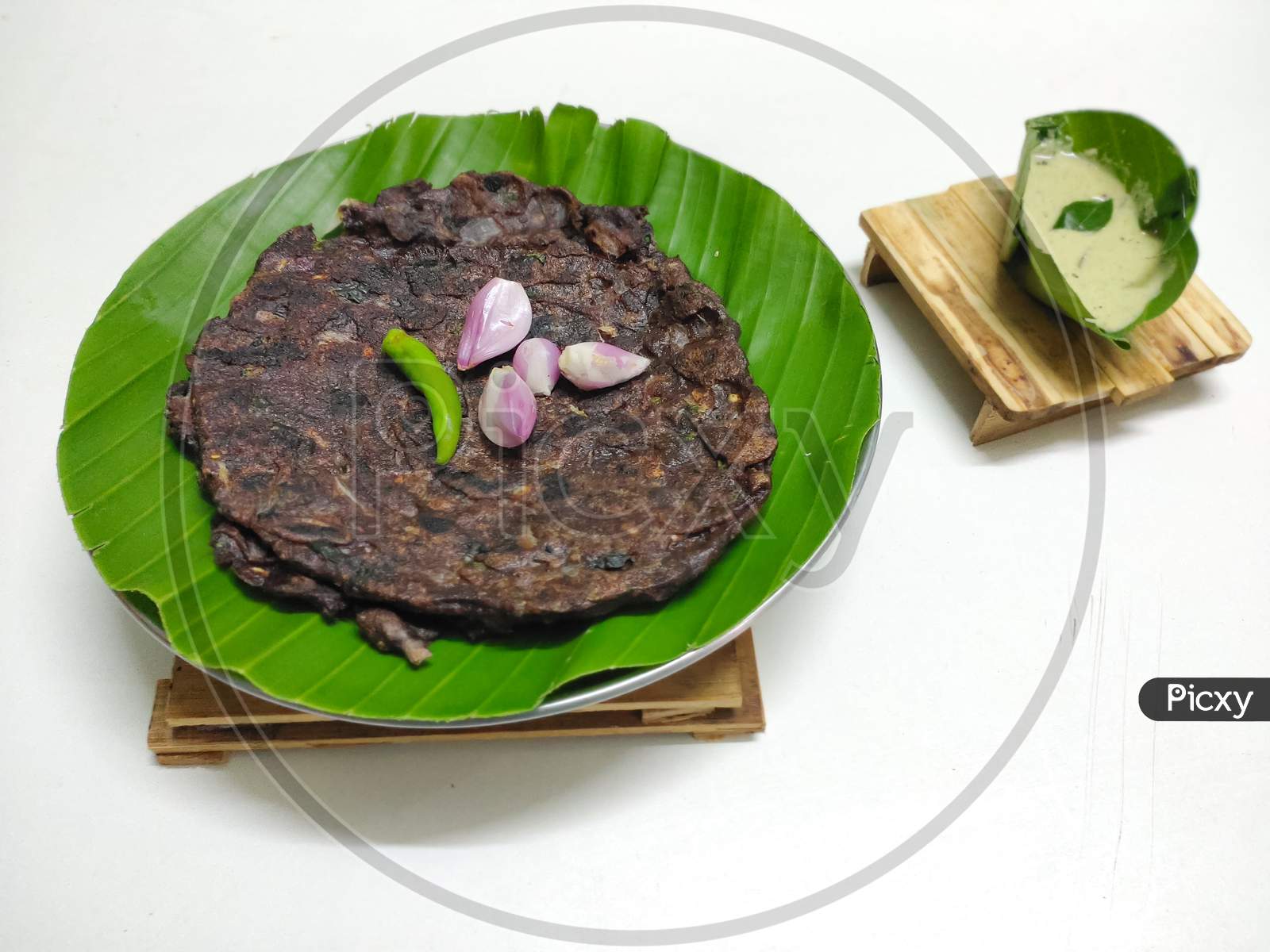Image of Closeup of Indian Traditional dish Ragi roti made with finger ...
