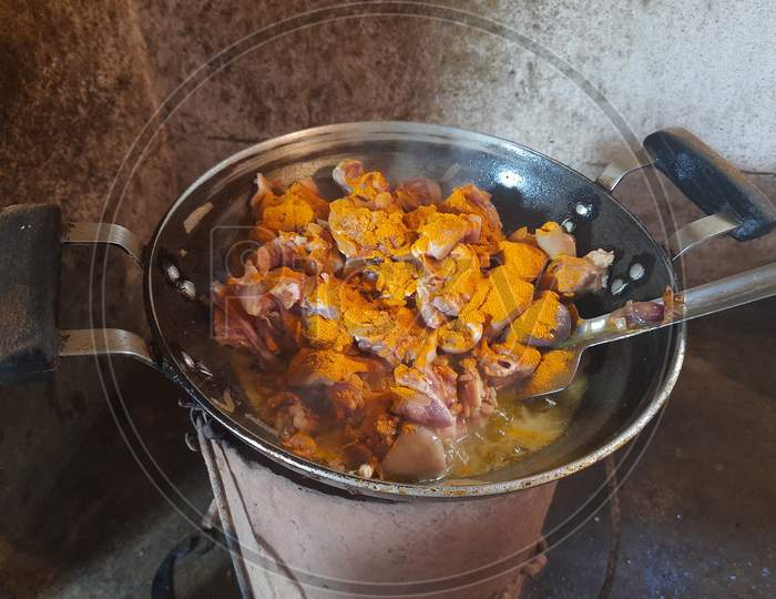 Image of Cooking Goat meat in a Frying Pan-OC848839-Picxy