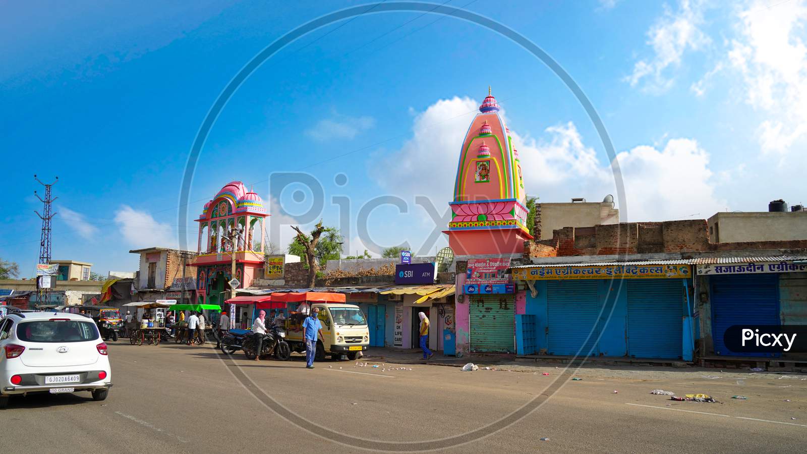 Image of Attractive Sight Of Hindu Temple With White Clouds And Blue ...