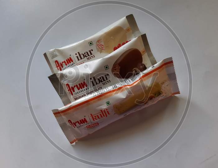 Image of Closeup of Raspberry Ripple, Chocolate, and Kulfi flavor Arun ...