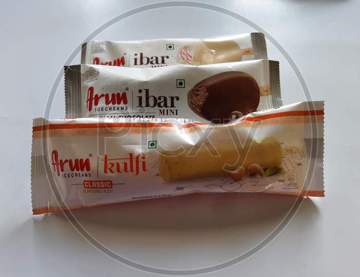 Image of Closeup of Raspberry Ripple, Chocolate, and Kulfi flavor Arun ...