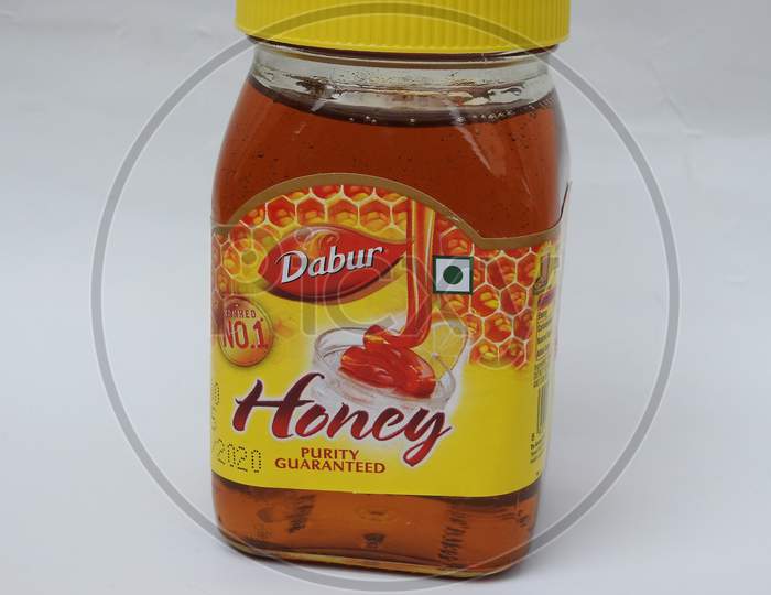 Image of Closeup of Worlds No.1 Honey Brand - 250 gm Dabur Honey glass ...