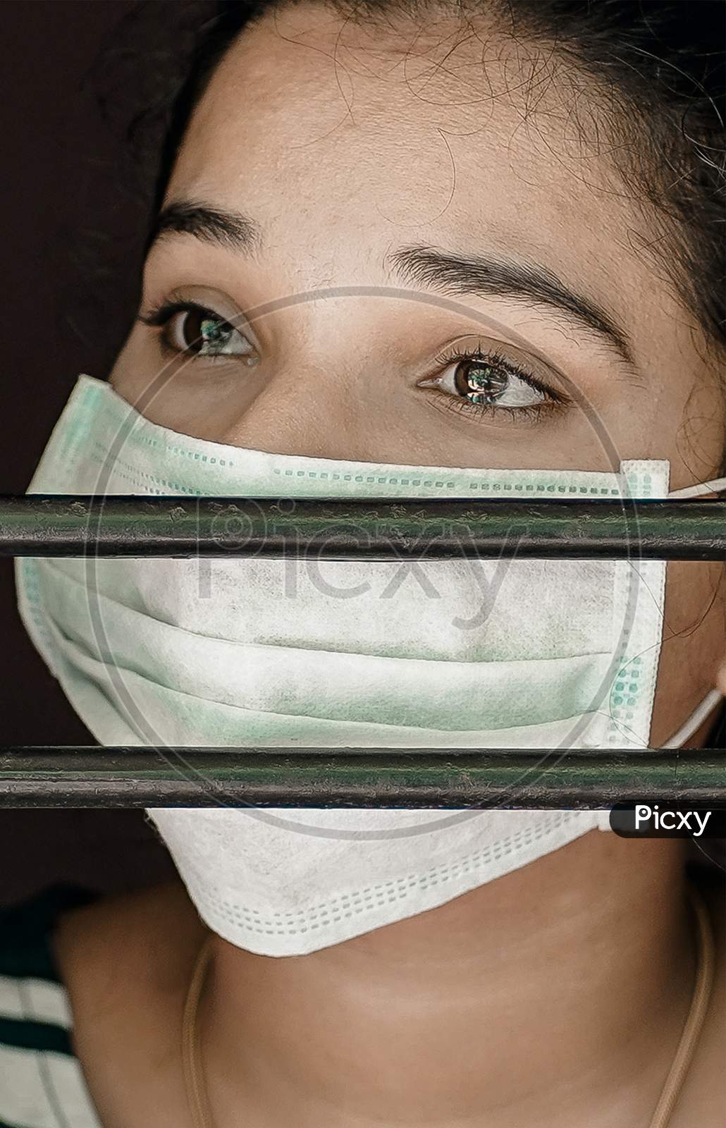 Image of Woman Wearing Face Mask Crying.-FY877750-Picxy