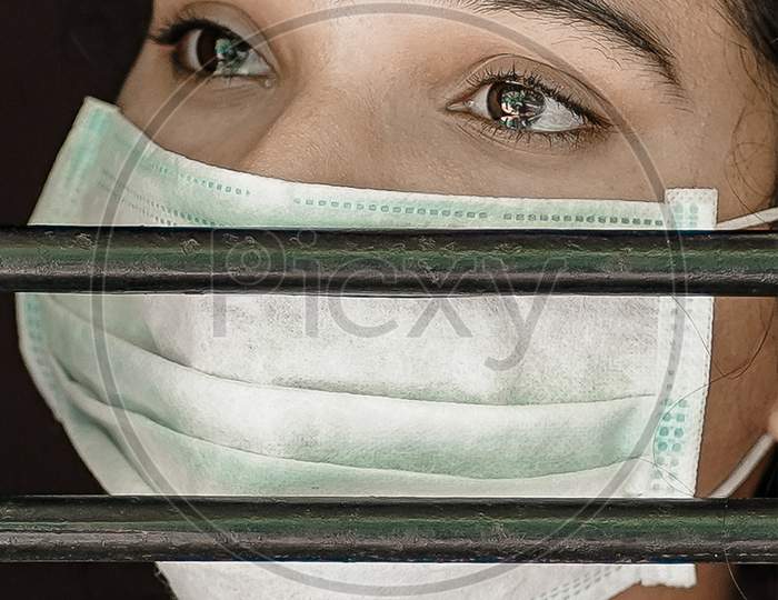 Image of Woman Wearing Face Mask Crying.-FY877750-Picxy