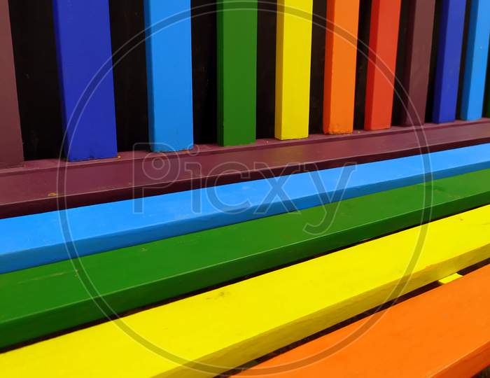 Image of Colorful bench with different shiny colors as symbol for ...