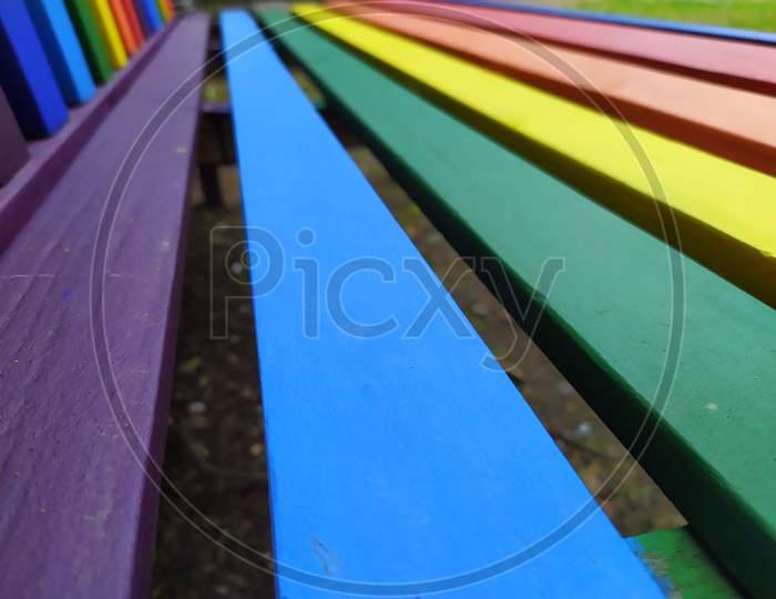 Image of Colorful bench with different shiny colors as symbol for ...