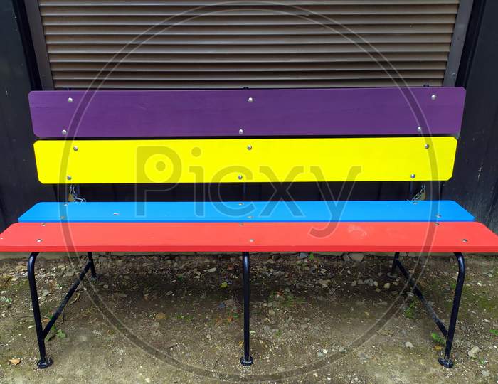 Image of Colorful bench with different shiny colors as symbol for ...